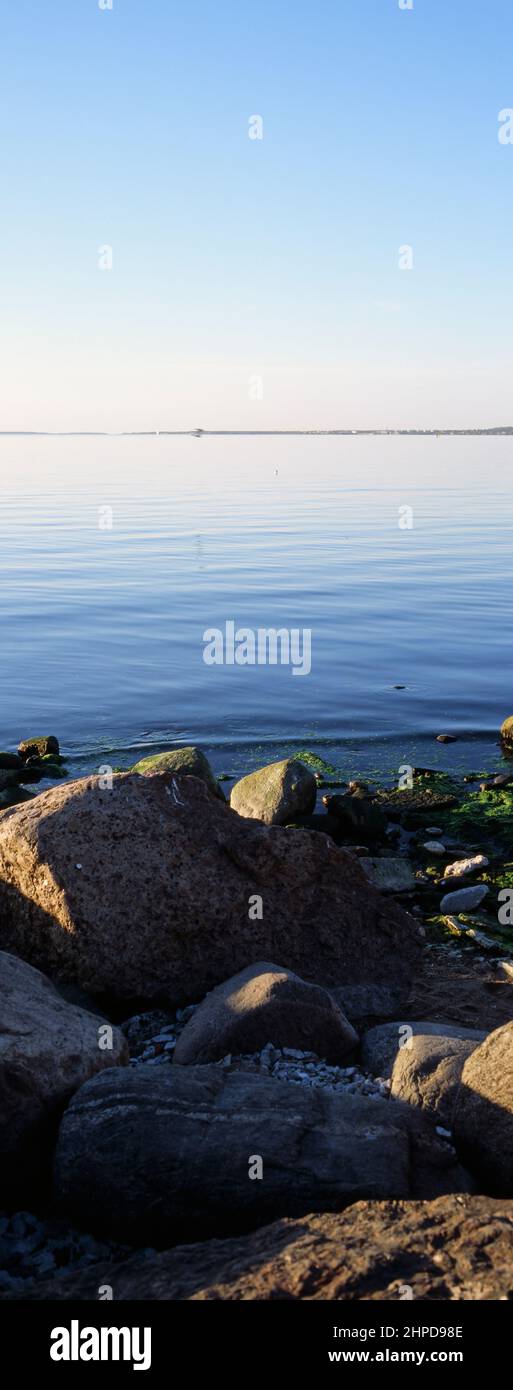 Calm sea at dusk along the Baltic Coast at the edge of Tallinn, Estonia ...