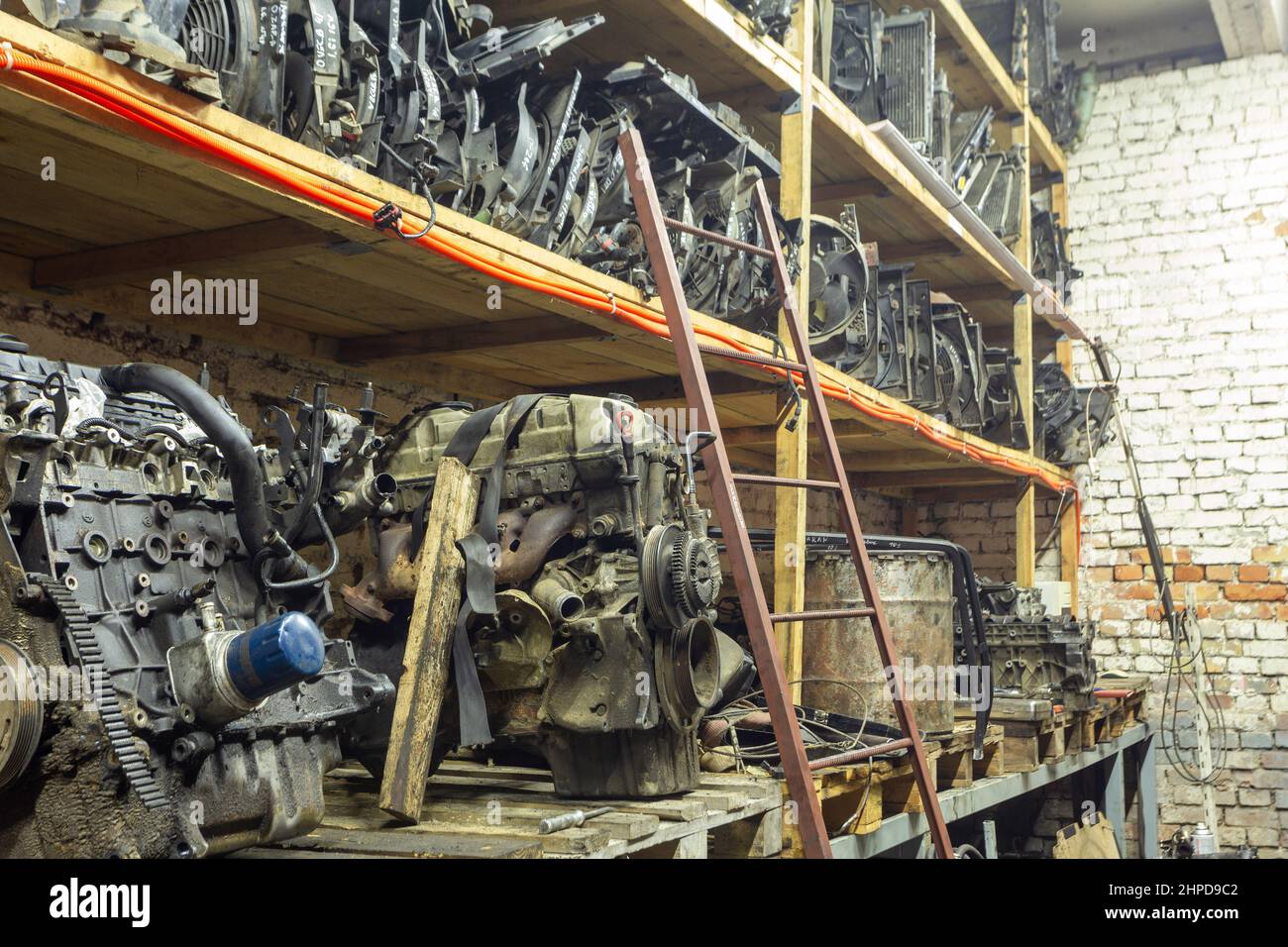 Warehouse with used auto parts for sale. Radiators of the cooling ...