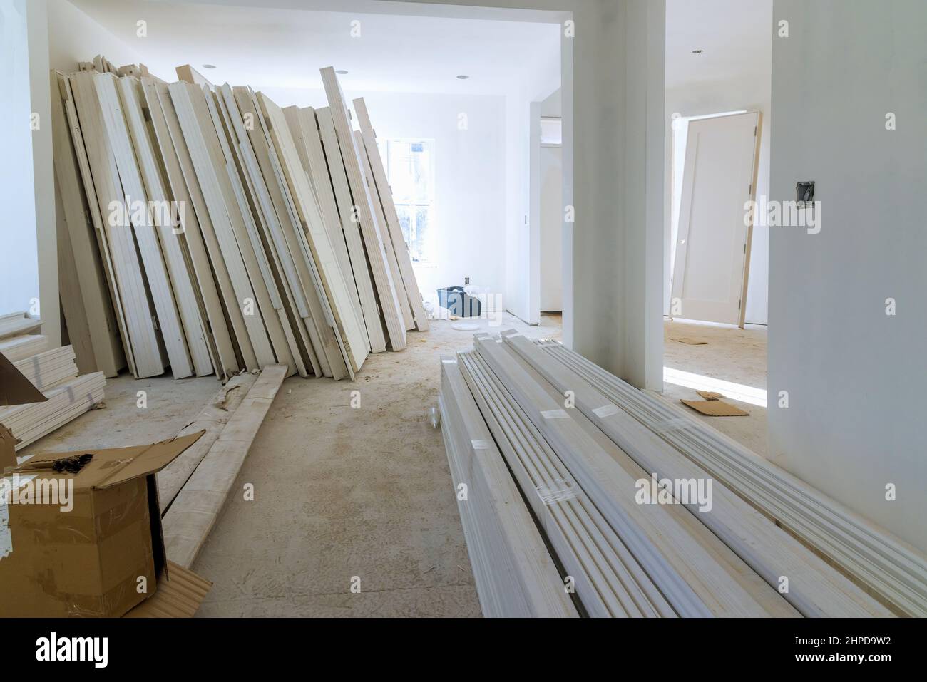 A new home interior wooden stacker doors a wait installation Stock ...
