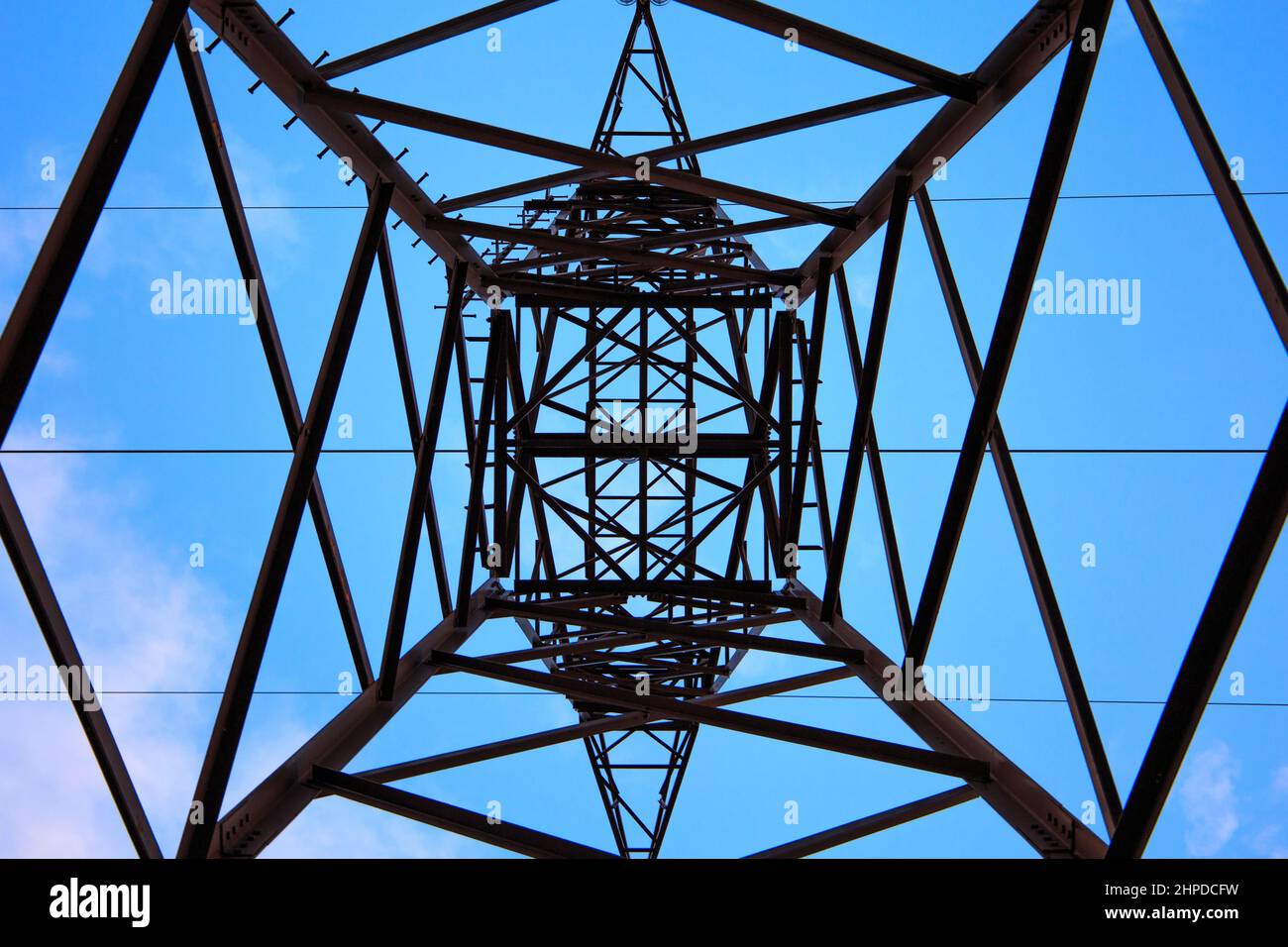 Closeup of a Mountain Electricity pylon from below Stock Photo - Alamy