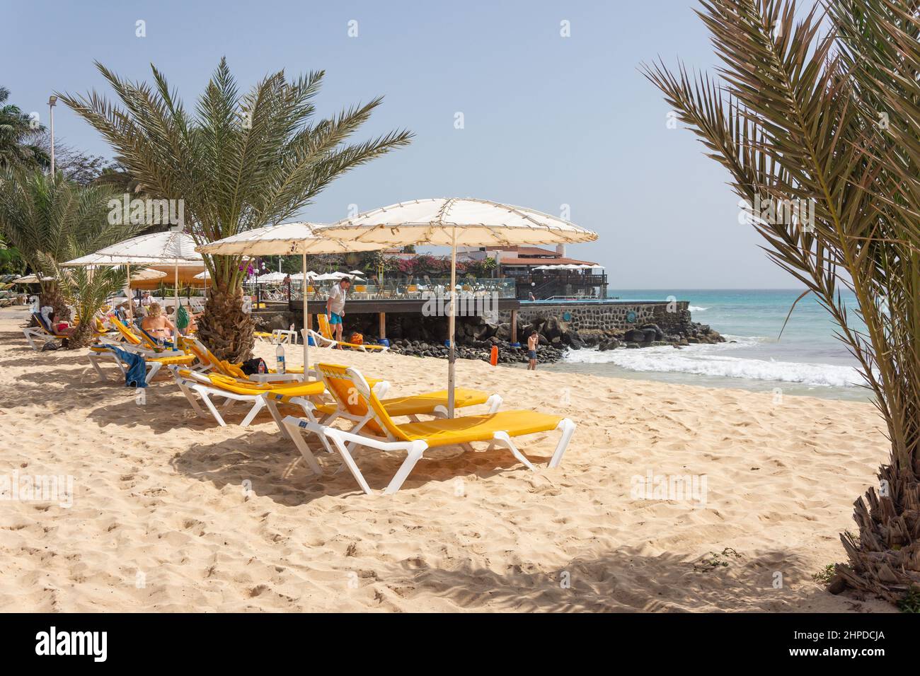Sunbeds and parasols on beach, Praia Santa Maria, Santa Maria, Sal ...