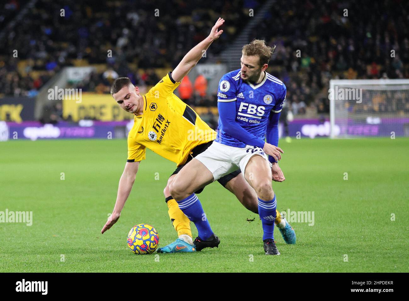 WOLVERHAMPTON, UK. FEB 19TH. Leander Dendoncker of Wolves challenges ...