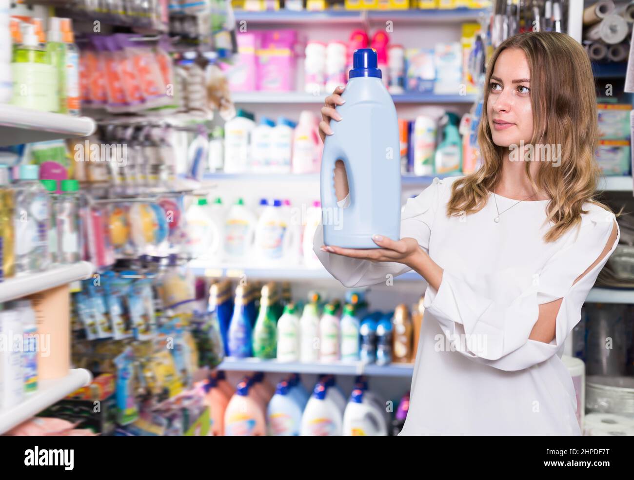 Woman holding detergent box hi-res stock photography and images - Alamy