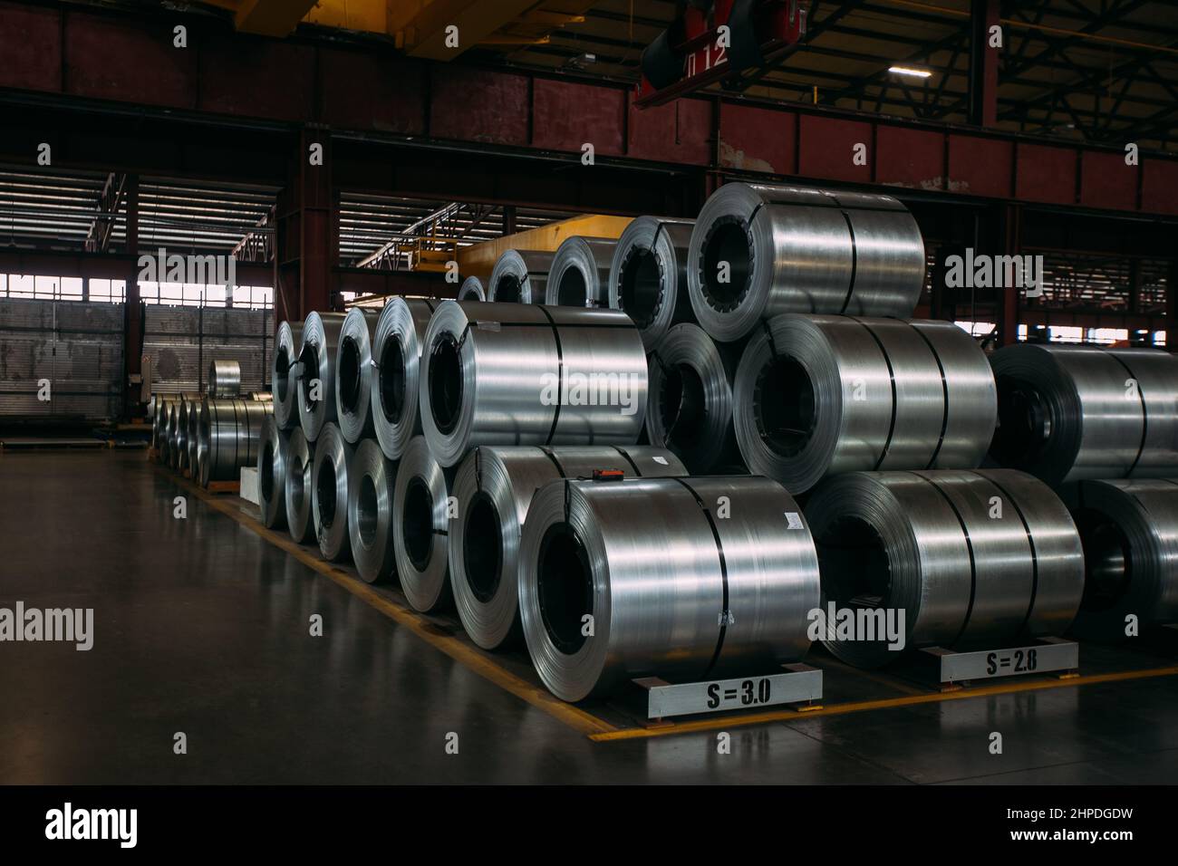 Rolls of galvanized steel sheet inside the factory or warehouse Stock ...
