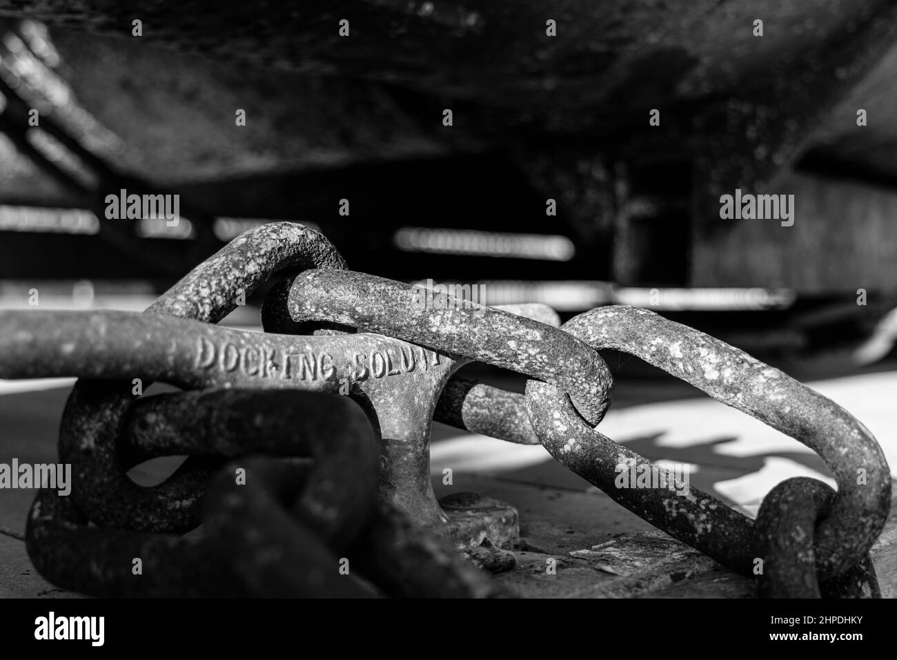 Closeup grayscale shot of a Mooring Chain on cleat with barnacles Stock ...