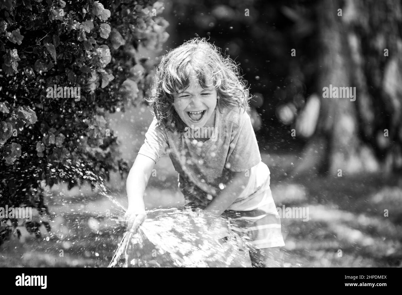 Kid have fun. Funny boy happy smiling on natural landscape. Little ...