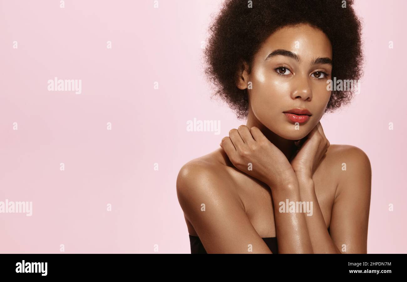 Attractive female african model with natural makeup, glowing healthy ...
