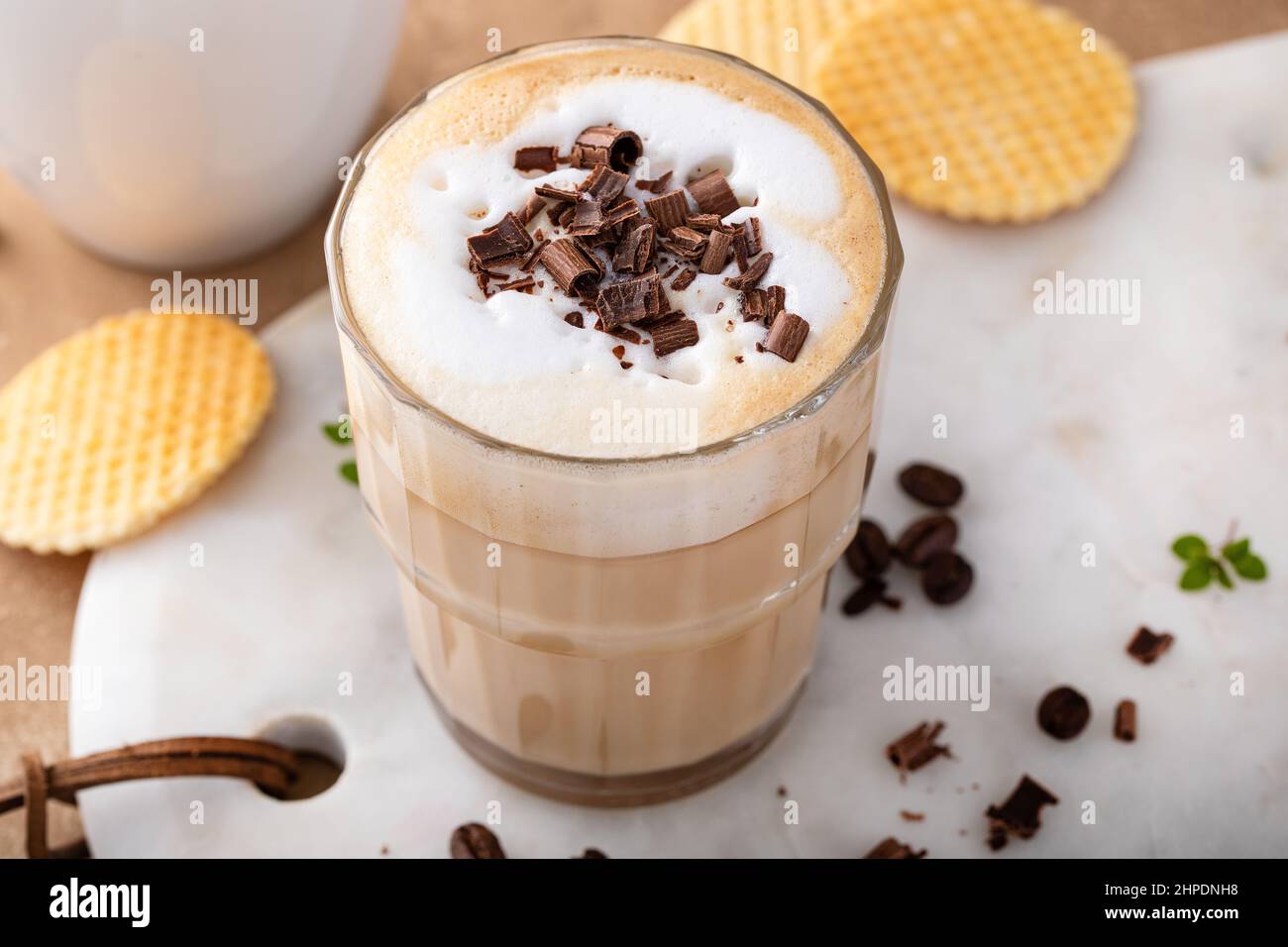 Hot coffee latte and cappuchino in a glass and mug Stock Photo - Alamy