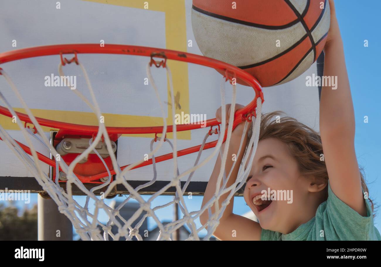 Basketball kids game. Cute little child boy holding a basket ball ...