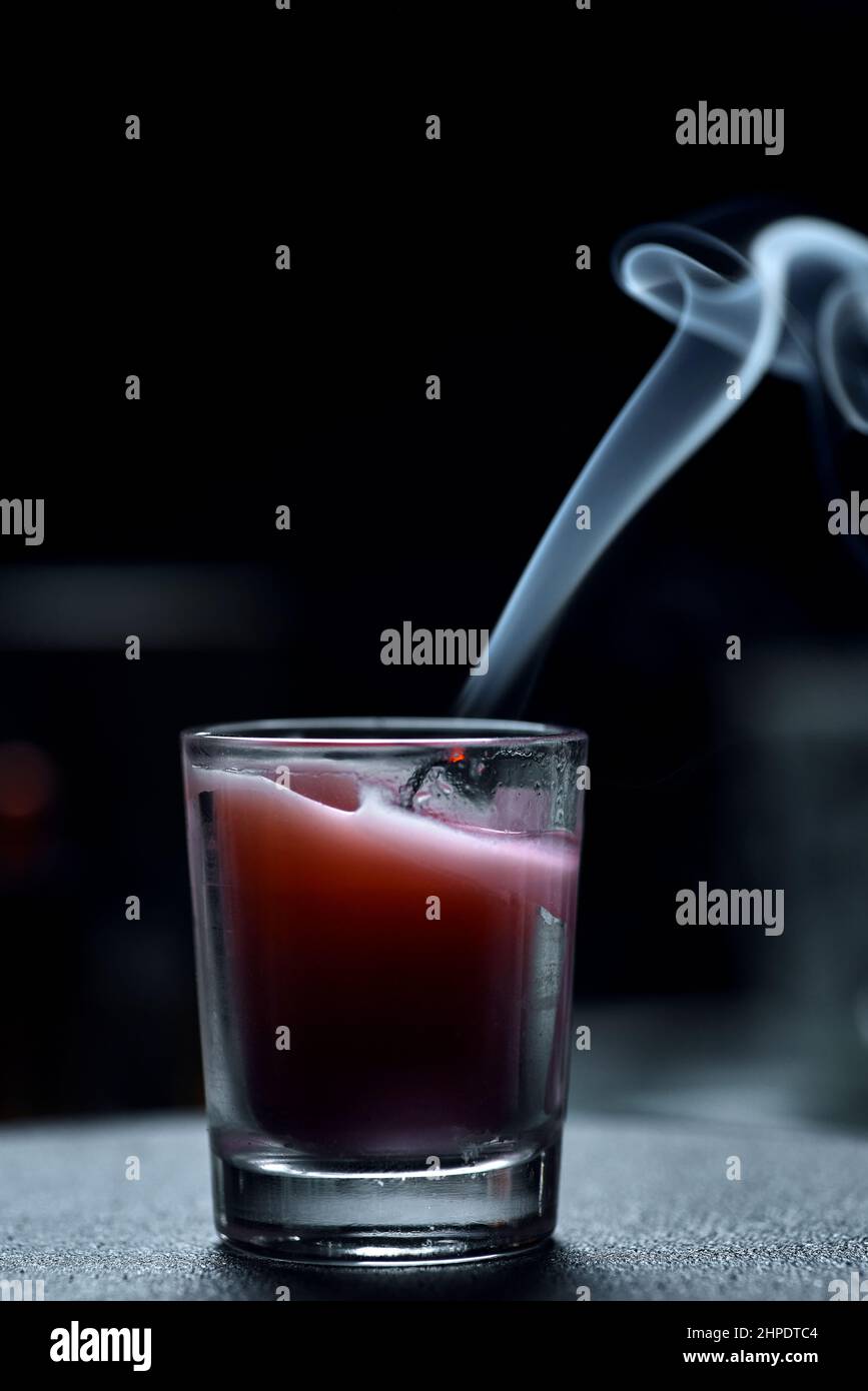 The extinguished candle smoke Stock Photo - Alamy