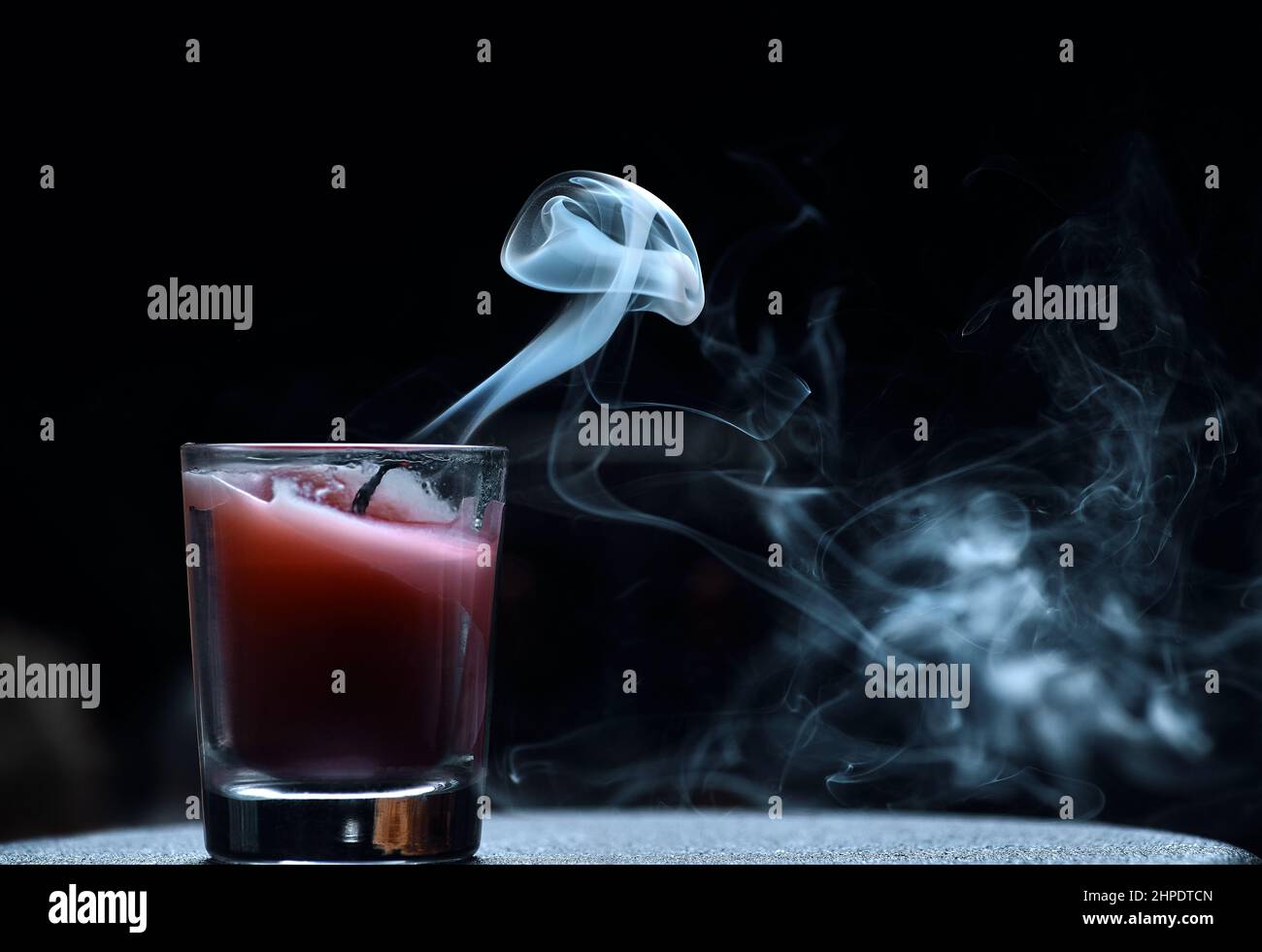 The extinguished candle smoke Stock Photo - Alamy