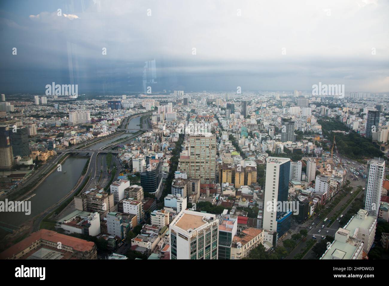 Aerial view of the skyscrapers with the Saigon river flowing through Ho ...
