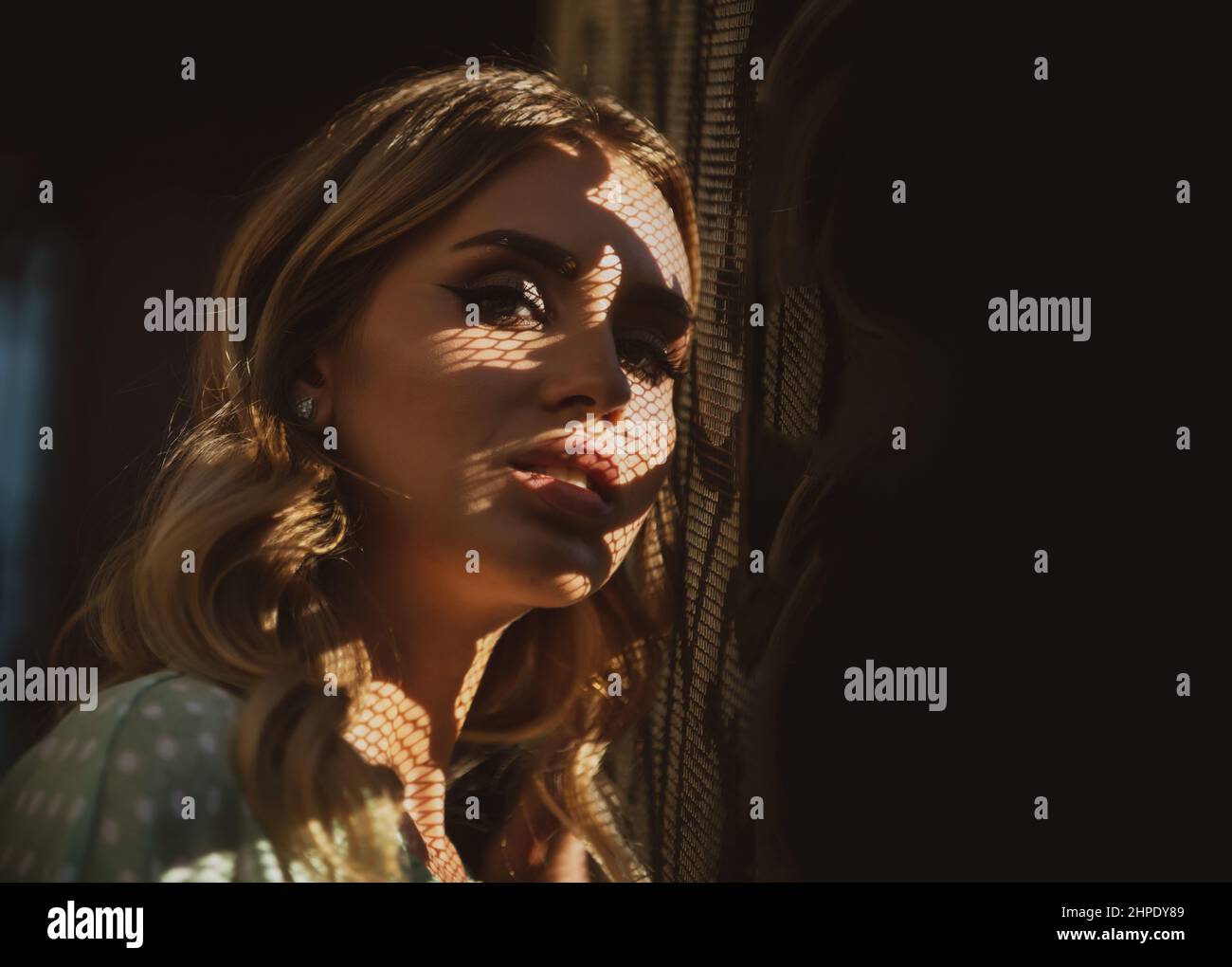 Woman face in shadow, romantic casual woman portrait. Beautiful girl ...