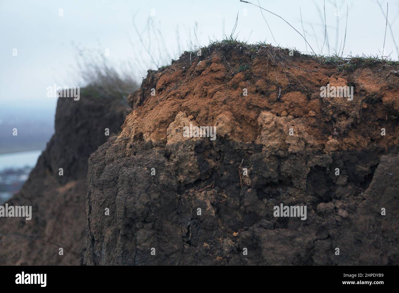 Layers of cliff soil . Land ground background Stock Photo - Alamy