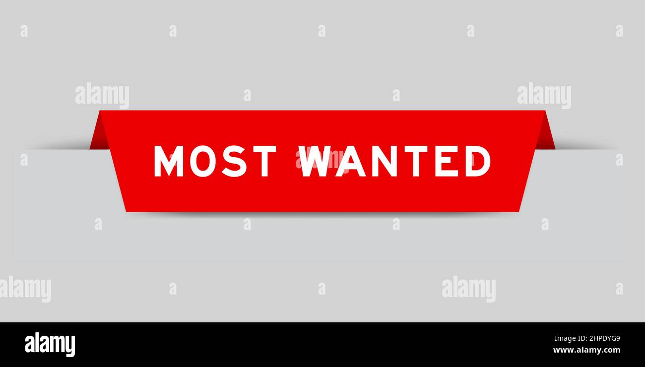 Red color inserted label with word most wanted on gray background Stock ...