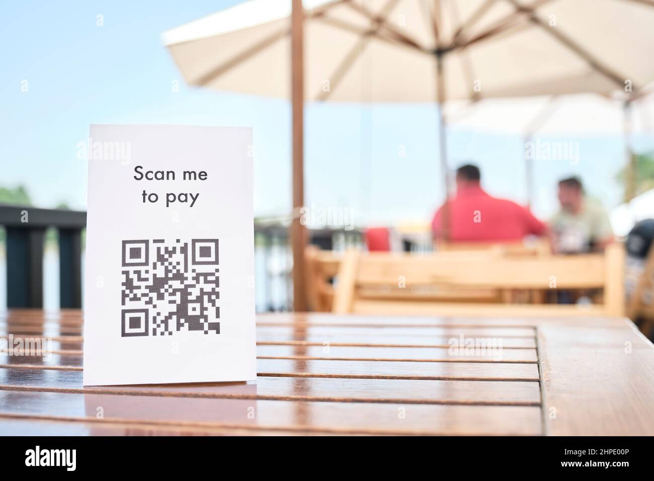QR code for contactless, cashless payment, placed on the table of a ...