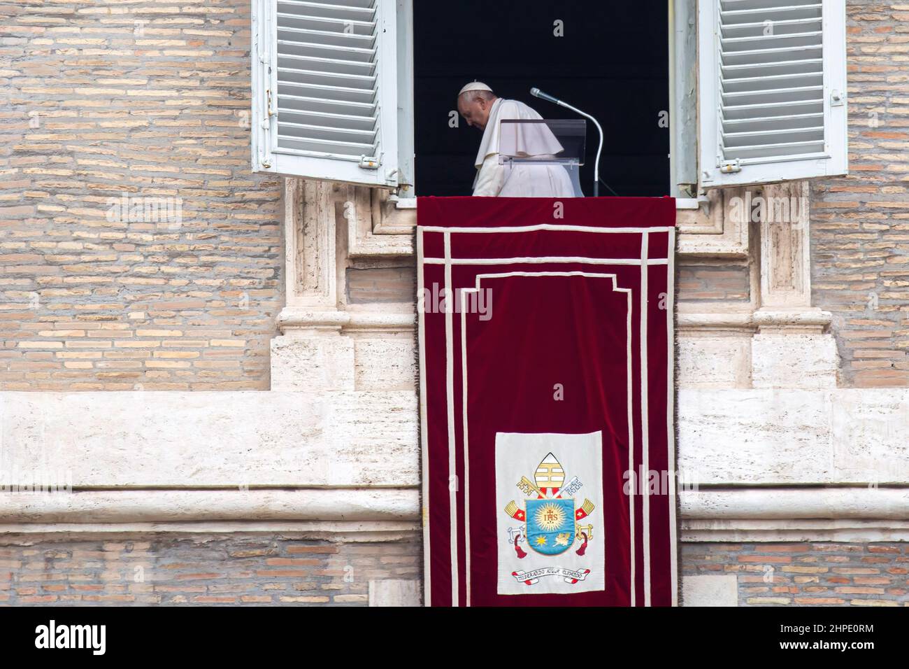 Pope Francis leaves after the Angelus prayer. Pope Francis delivers the ...