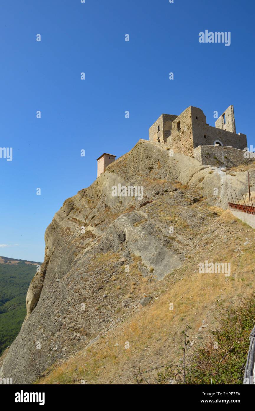Historical castle on the arid hill of Brindisi di Montagna in the ...