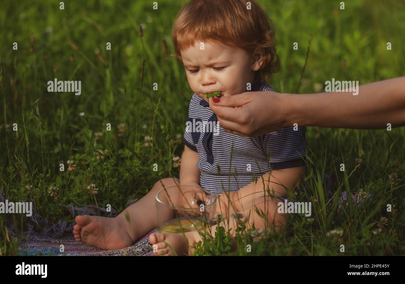 Mothers hand feeding spoon cute hi-res stock photography and images - Alamy
