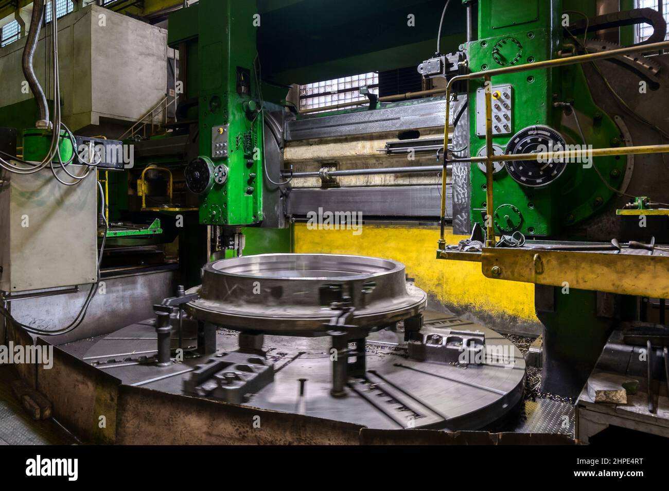 Vertical turning lathe machine tool used in plant workshop Stock Photo ...