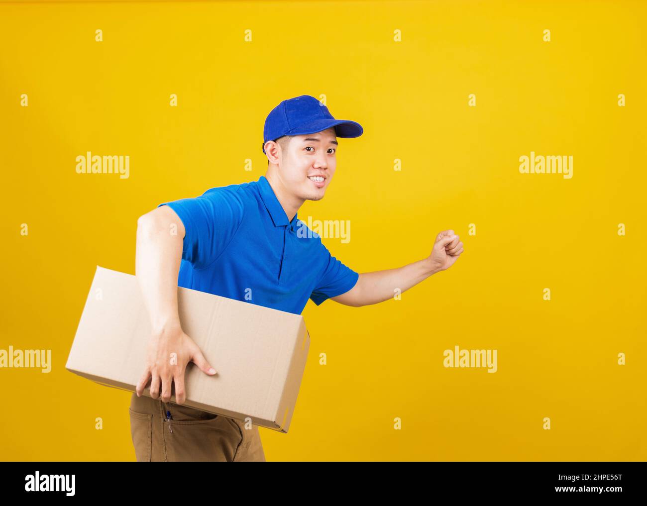 Portrait excited delivery happy man logistic standing smile wearing ...
