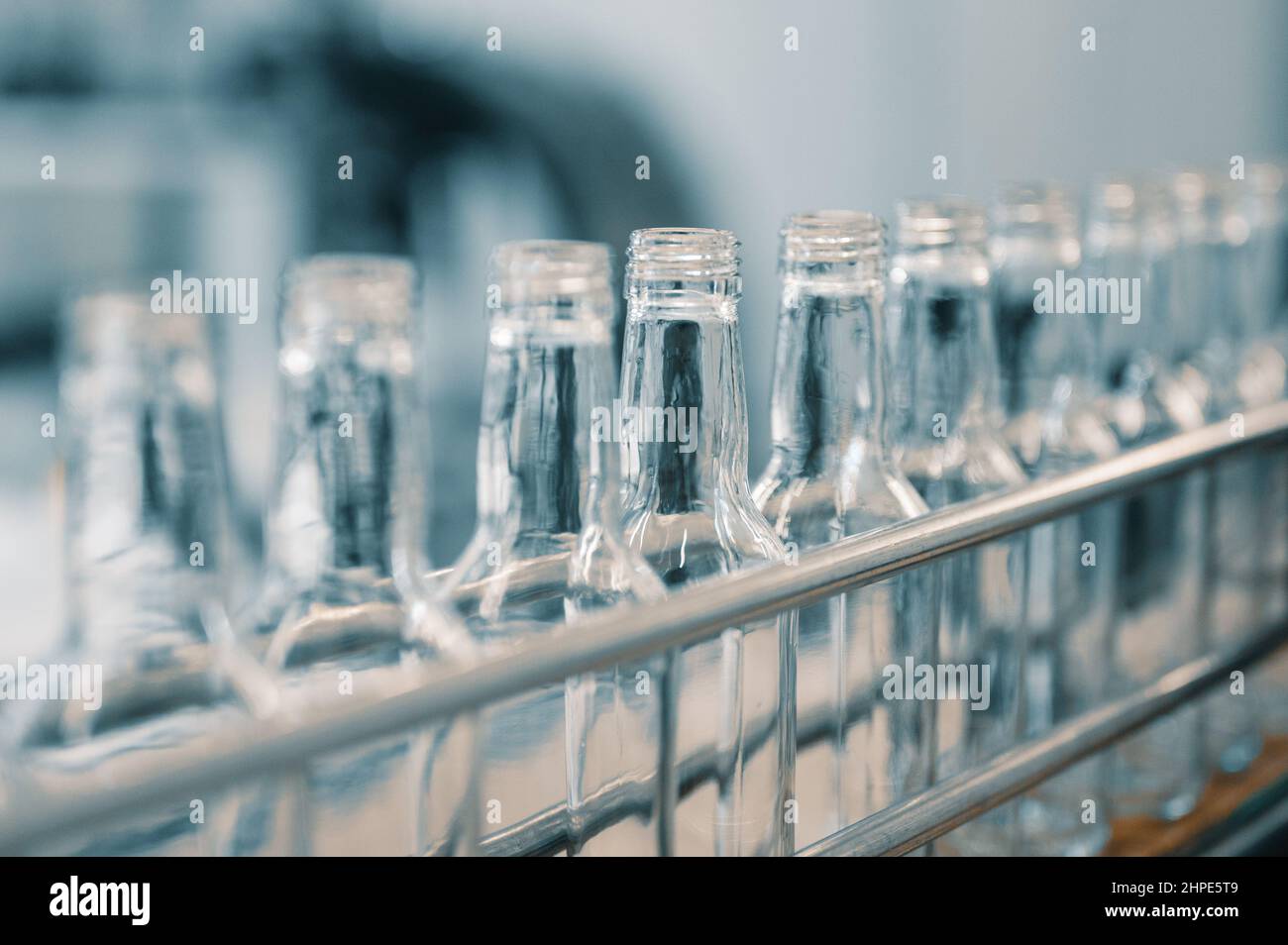 Row of glass bottles to fill with expensive alcohol drinks Stock Photo ...