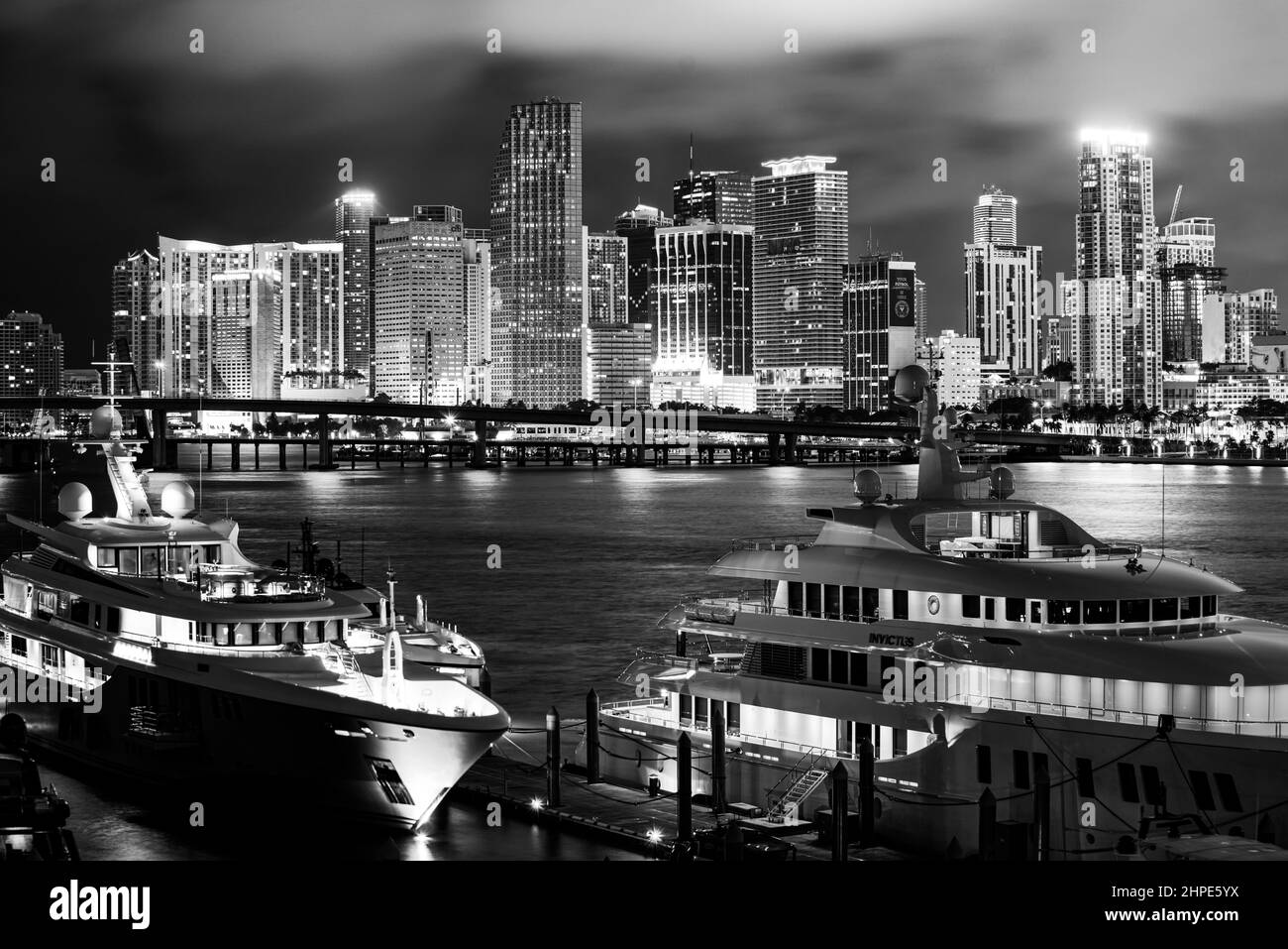 Miami Florida at sunset, skyline of illuminated buildings and Macarthur ...