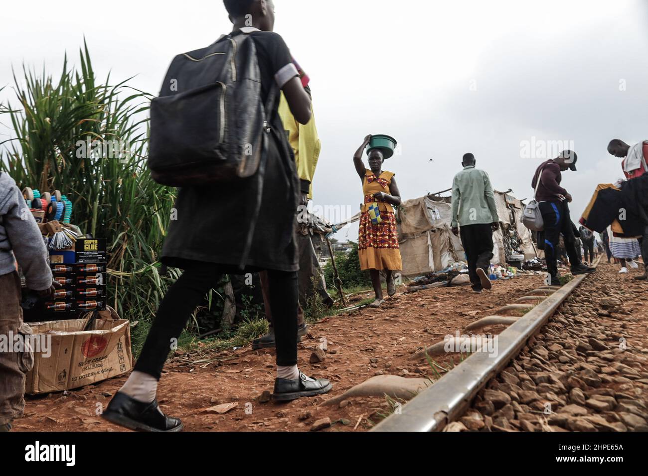 Nairobi, Kenya. 18th Feb, 2022. Local residents go about their day-to ...