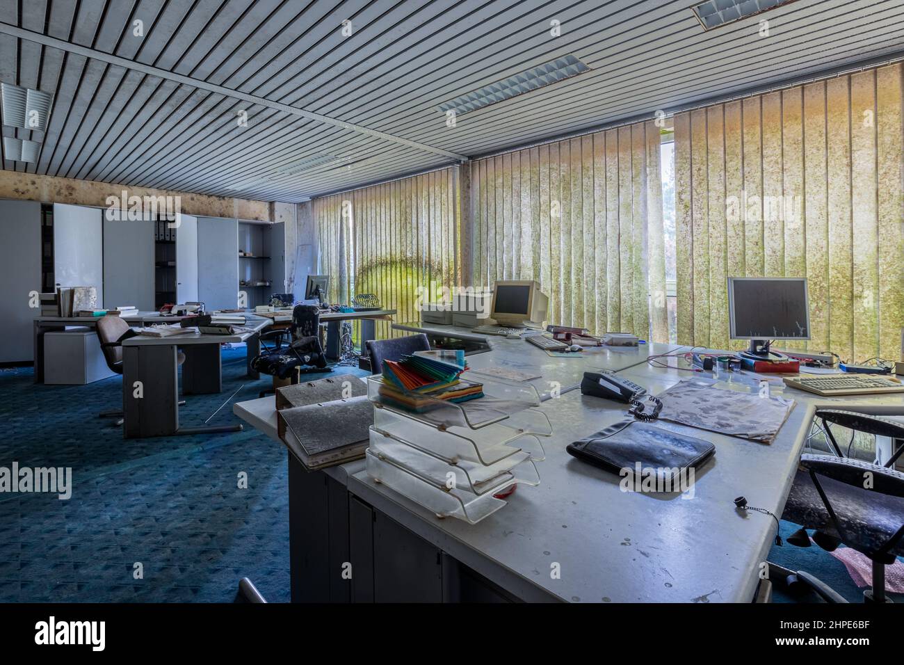 Deserted office with mold. Open plan office Stock Photo - Alamy