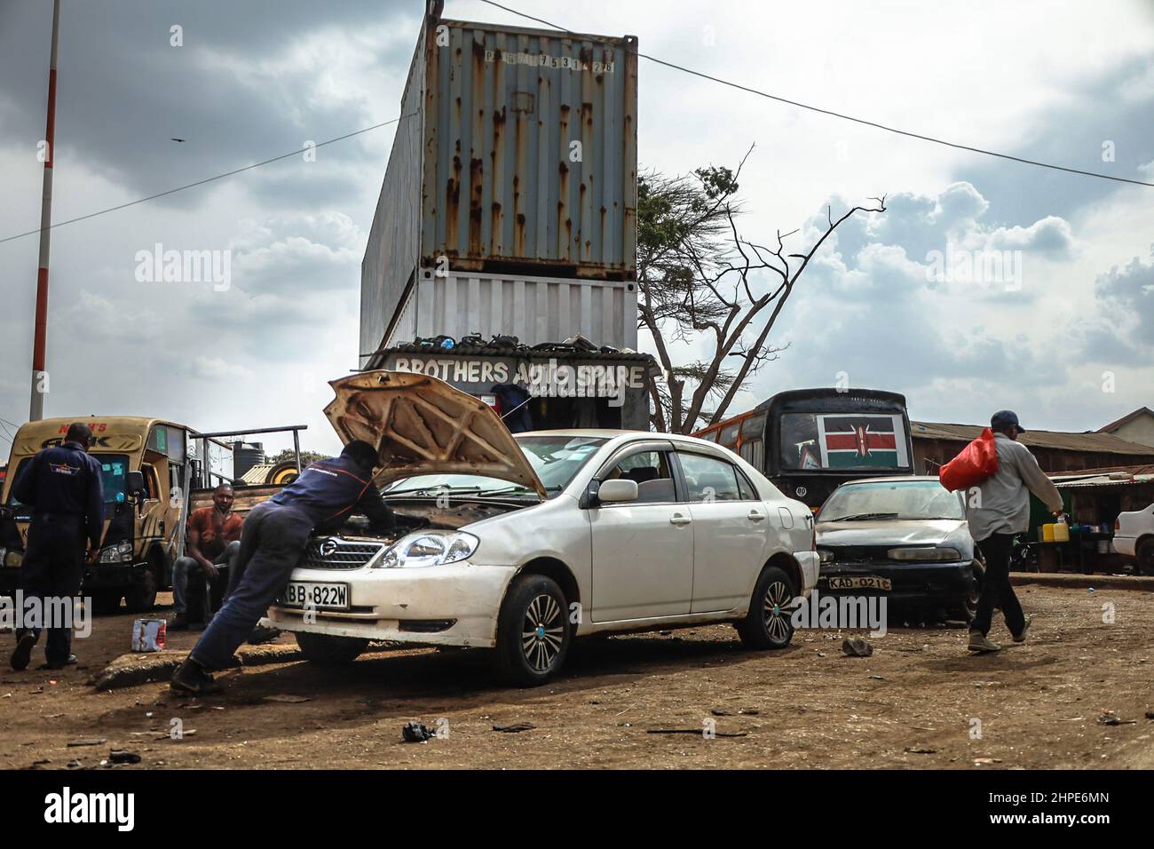 Mechanics repair vehicles at Kibera's old bus station formerly known as ...