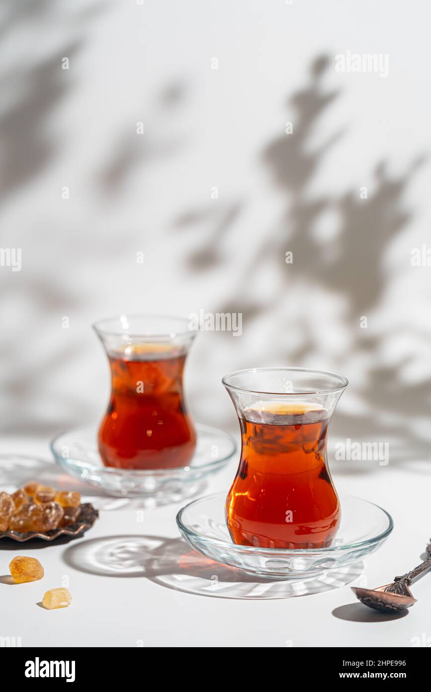 Turkish tea in traditional glass closeup on white background with ...