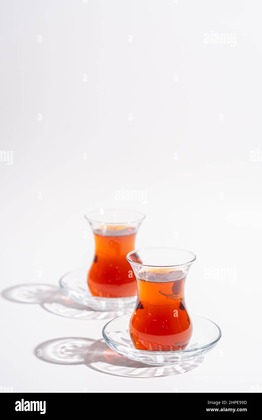 Turkish tea in traditional glass closeup on white background with ...