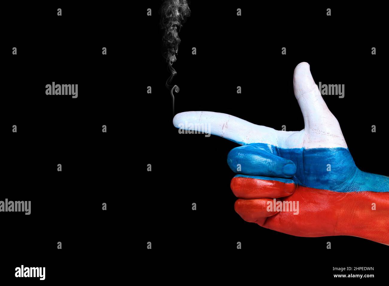 Hand in form pistol is painted in Russian tricolor with smoke coming ...