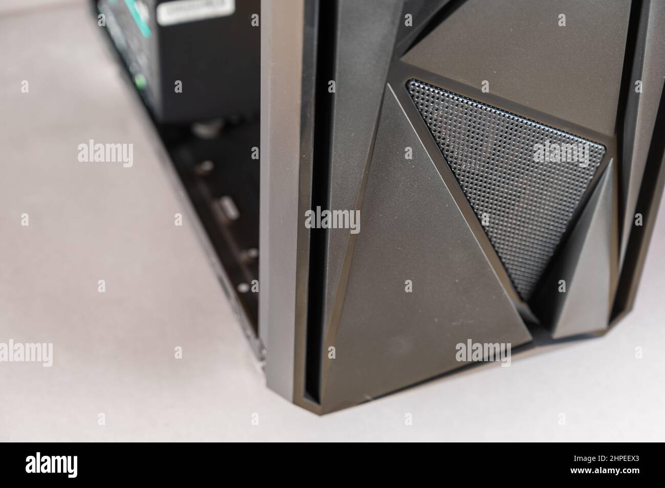 The front of a modern desktop computer. Black system unit in a ...