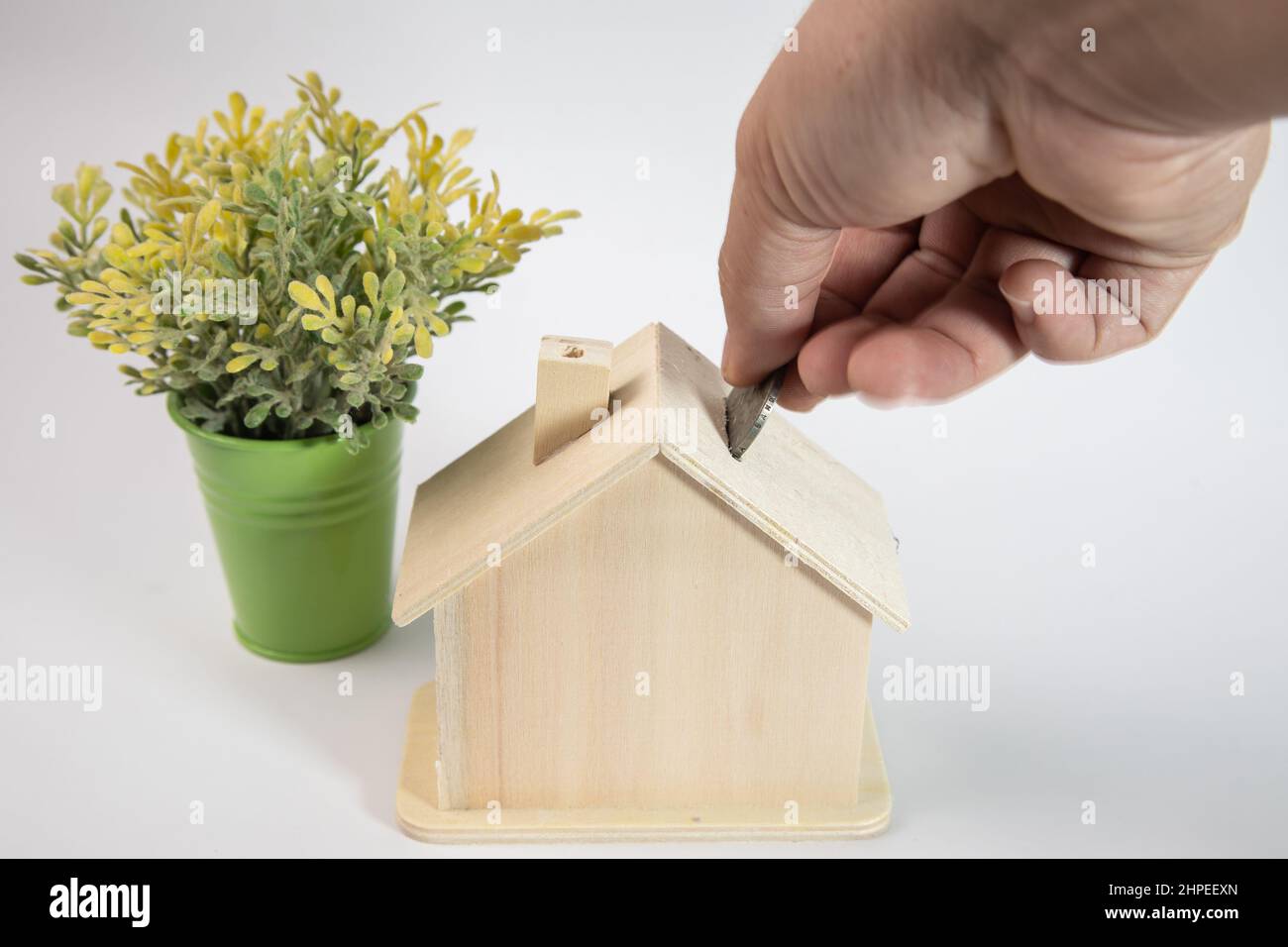 coin stack with house model saving money for buying house property ... coin stack with house model saving money for buying house property ...