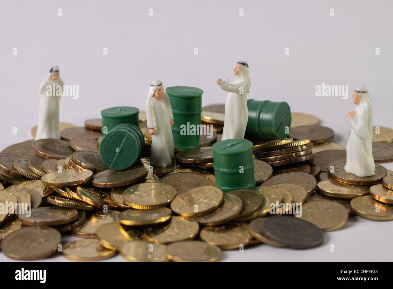 Stack Image of Coins with oils barrel. Crude oil commodity trading in ...