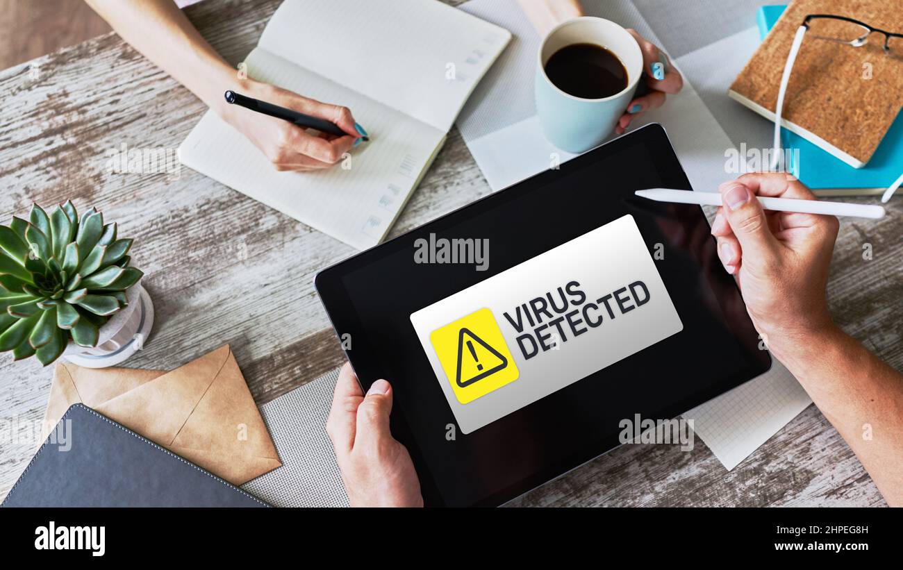 Virus Detected warning message on screen. Cyber security breach. Data ...