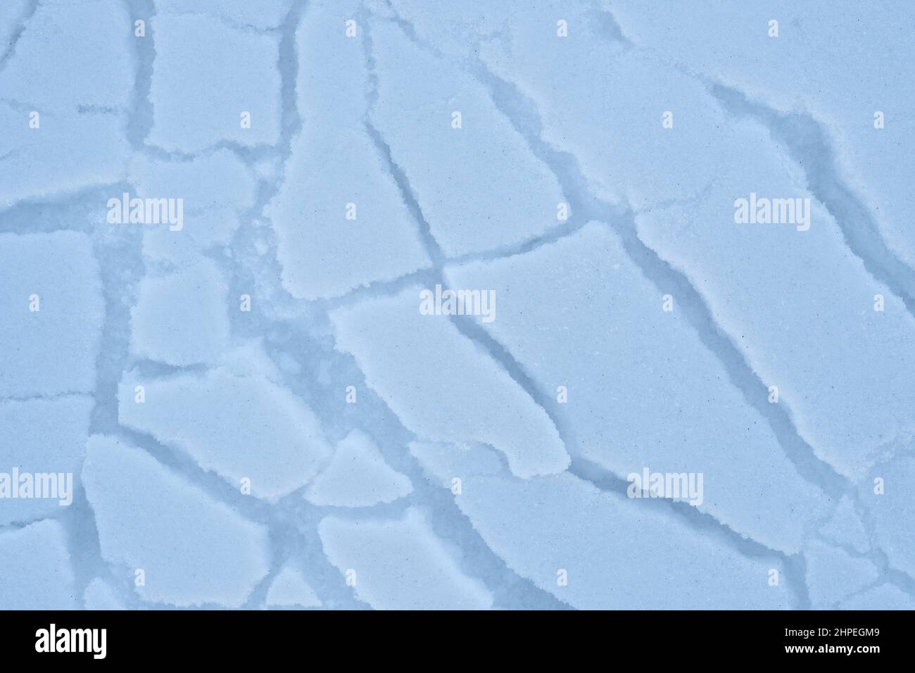 Abstract winter background texture of cracked snow Stock Photo - Alamy
