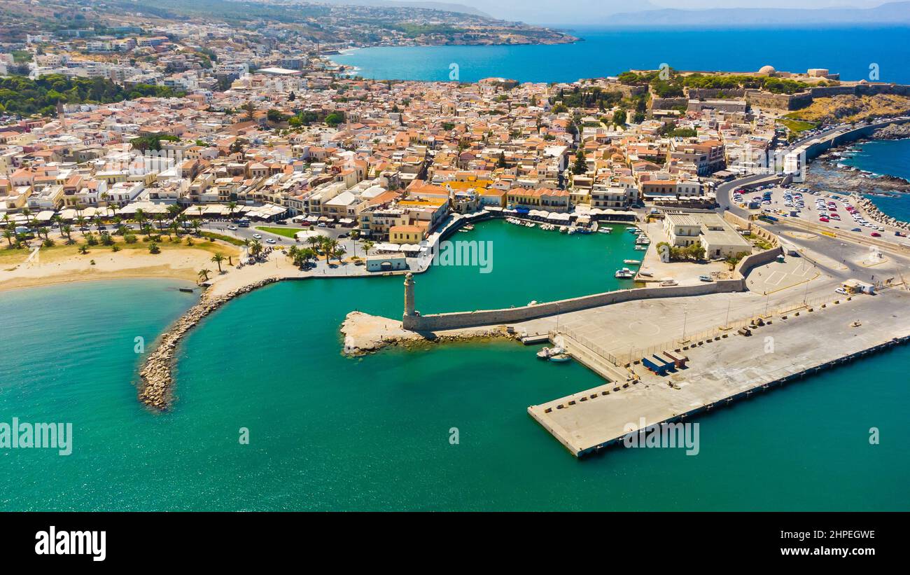 Crete, Greece. Harbor with marine vessels, boats and lighthouse ...