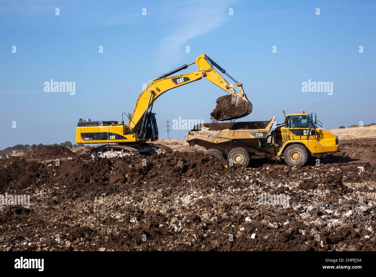 Tractors and trucks in construction work in a new settlements in Israel ...