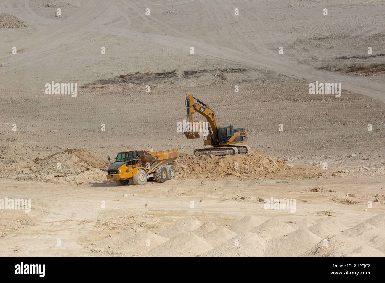 Tractors and trucks in construction work in a new settlements in Israel ...