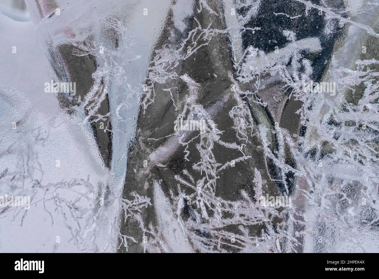ice texture with cracks and patterns. winter background Stock Photo - Alamy