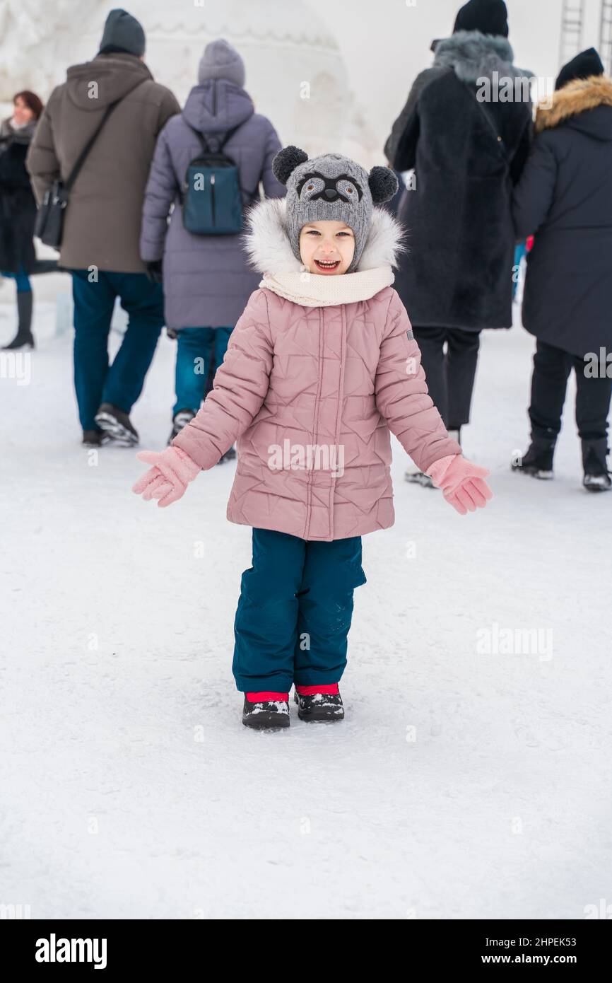 child happy at ice sculpture festival on winter day Stock Photo - Alamy