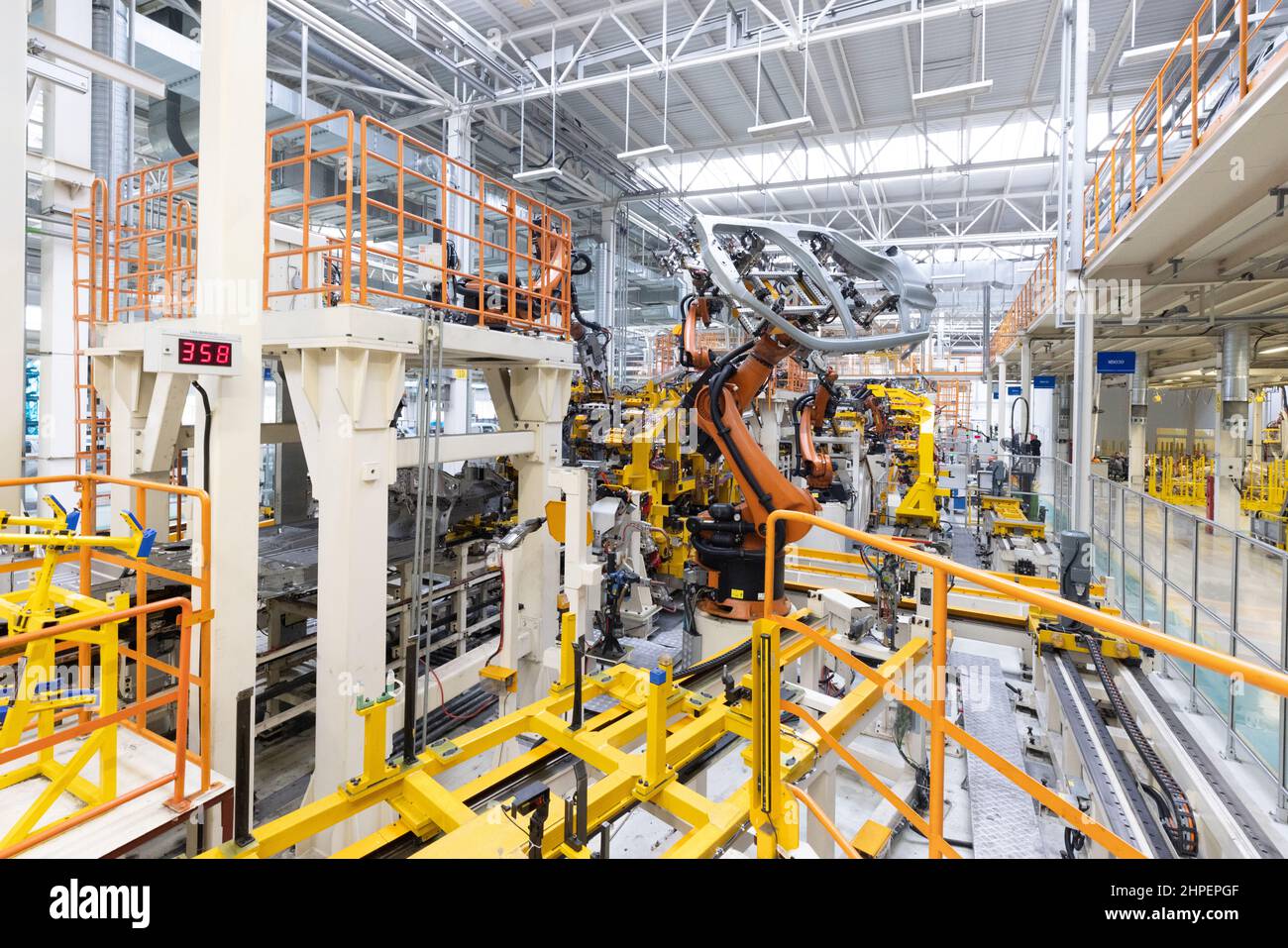 Photo of automobile production line. Welding car body. Modern car ...