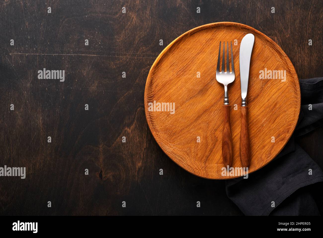 Vintage silverware. Rustic vintage set of wooden spoon and fork on ...