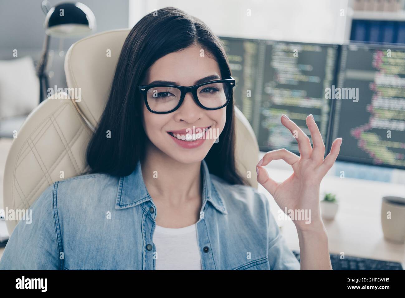 Portrait of attractive cheerful girl geek technician leader showing ok ...