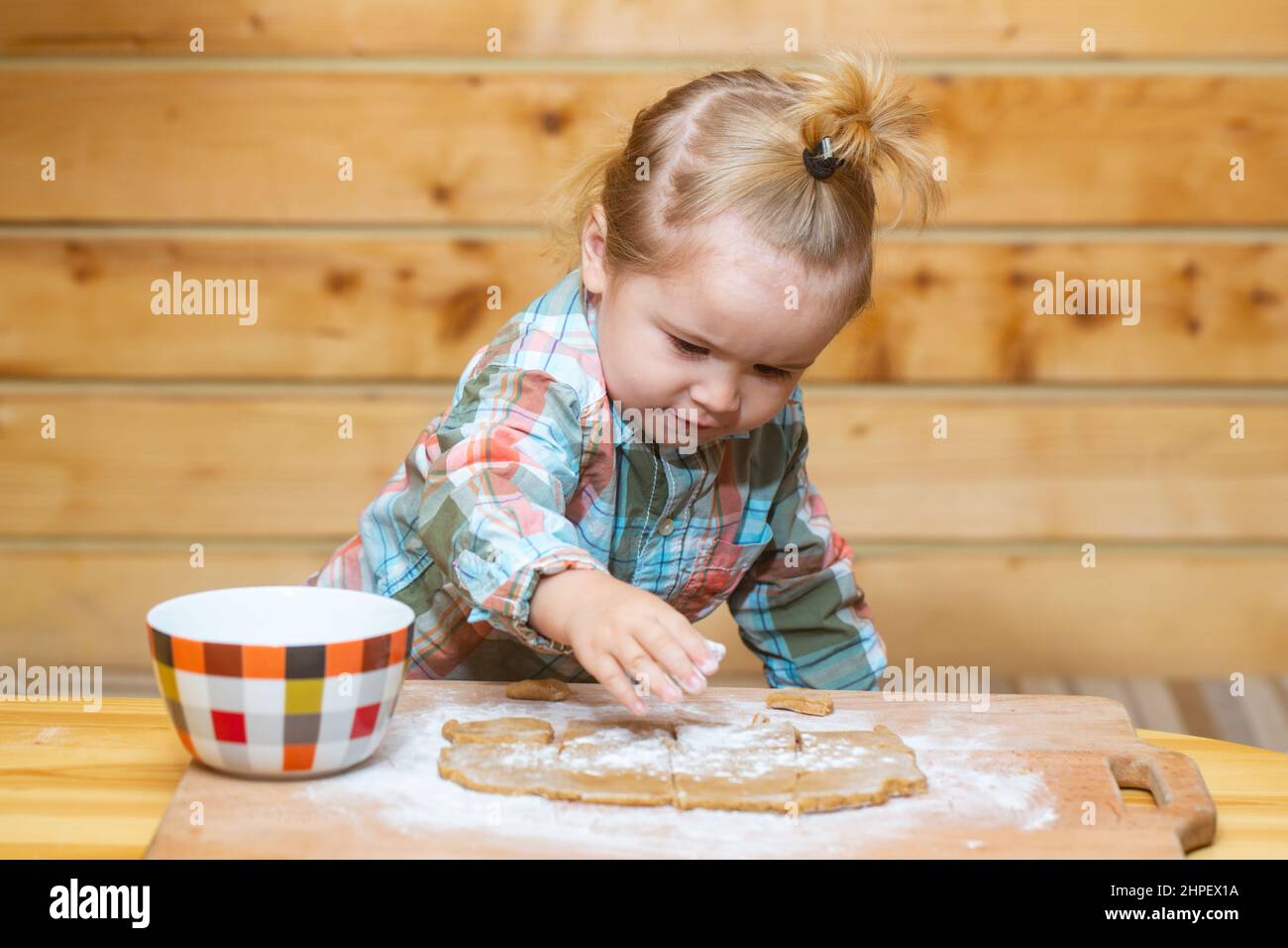 Little baker chef kid at kitchen. Happy baby child baking cookies Stock ...