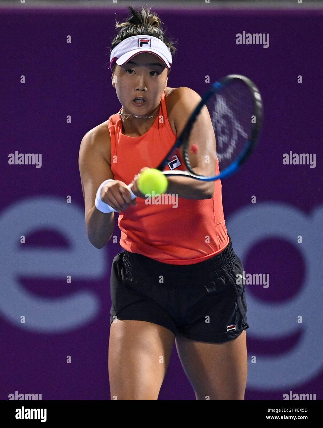 Doha, Qatar. 20th Feb, 2022. Ann Li of the United States hits a return ...