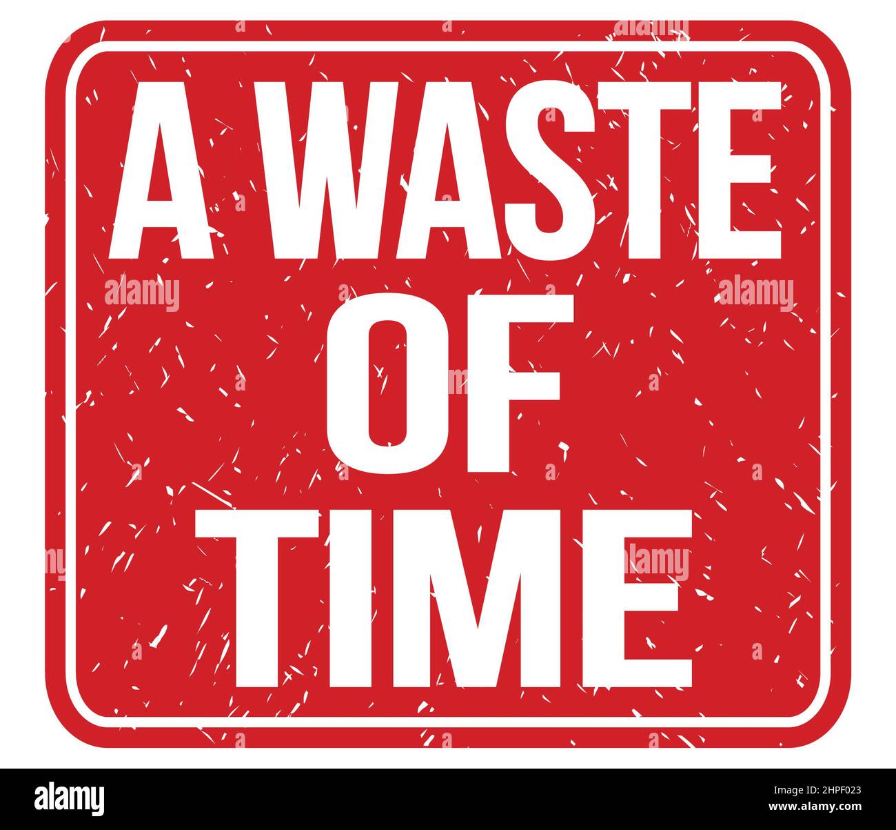 A WASTE OF TIME, text written on red vintage stamp sign Stock Photo - Alamy