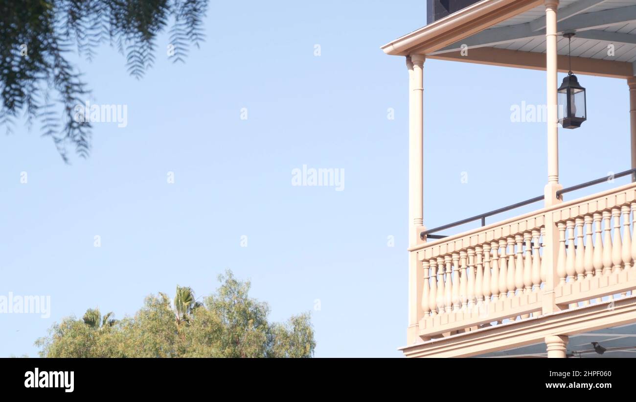 Wooden classic balcony, colonial style old historic house. Retro ...